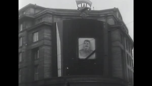 1953—Russian factory workers gather outside of a factory to receive ...