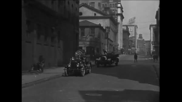 1920 - Firemen put out a fire in a tall building, and rescue victims ...