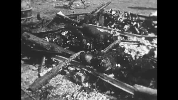 1945 - Corpses and burned bodies are seen at Buchenwald Nazi Holocaust ...