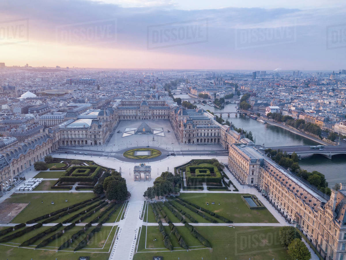 Aerial overview of the Tuileries and Louvre museum at sunrise ...