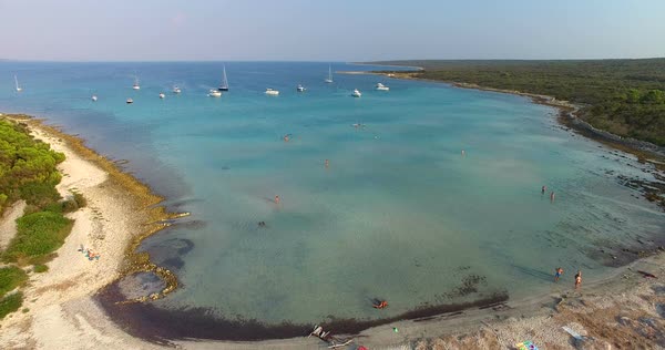 OLIB, CROATIA - 10 AUGUST 2015: Aerial view of tourists enjoying on ...
