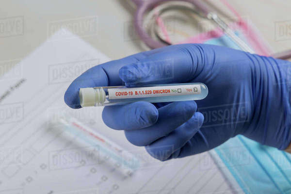 Medical worker holding swab sample collection kit,test tube for ...