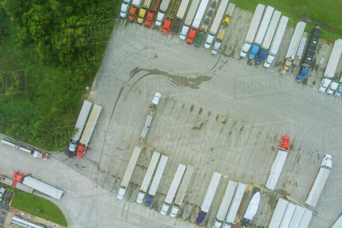 Aerial view of parking lot with trucks on transportation of truck rest ...