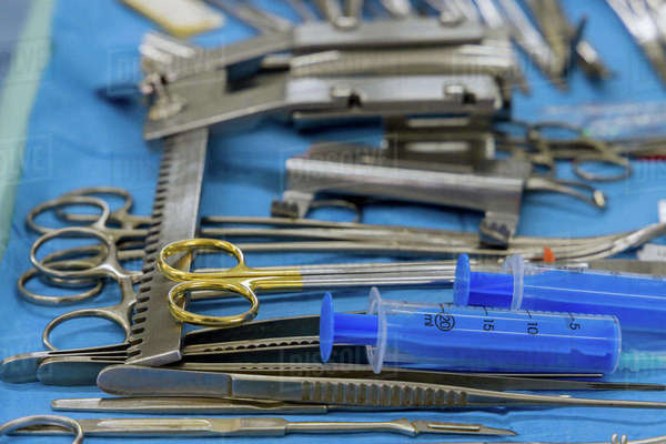 Set of different surgical instruments in the operating room in a ...