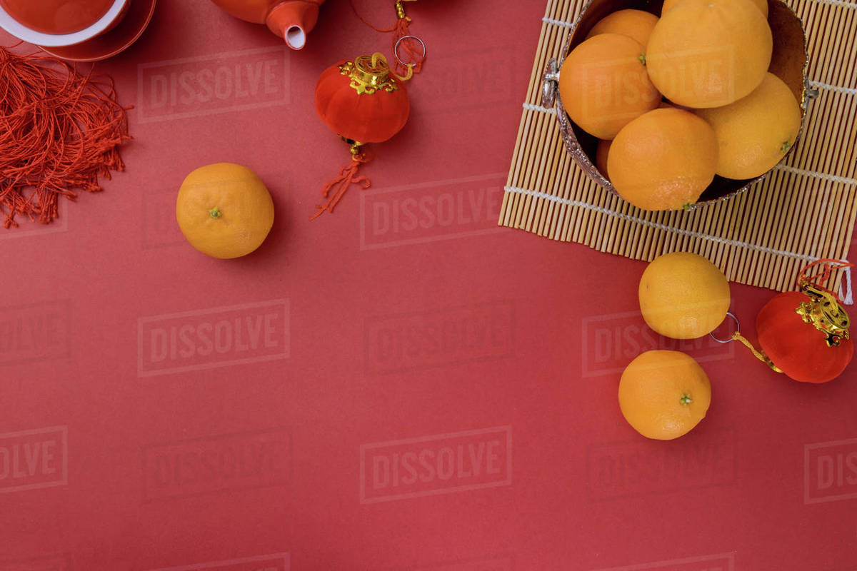 Traditional Chinese New Year festive ceremony with mandarin orange red ...