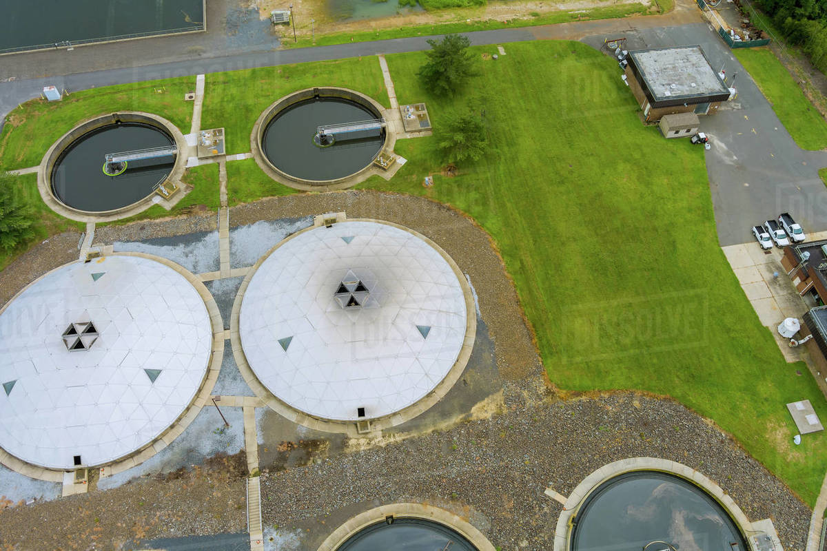 Aerial view of modern industrial water recycling sewage treatment plant ...