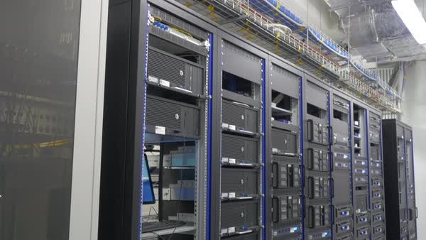 Many powerful servers running in the data center server room. Many ...