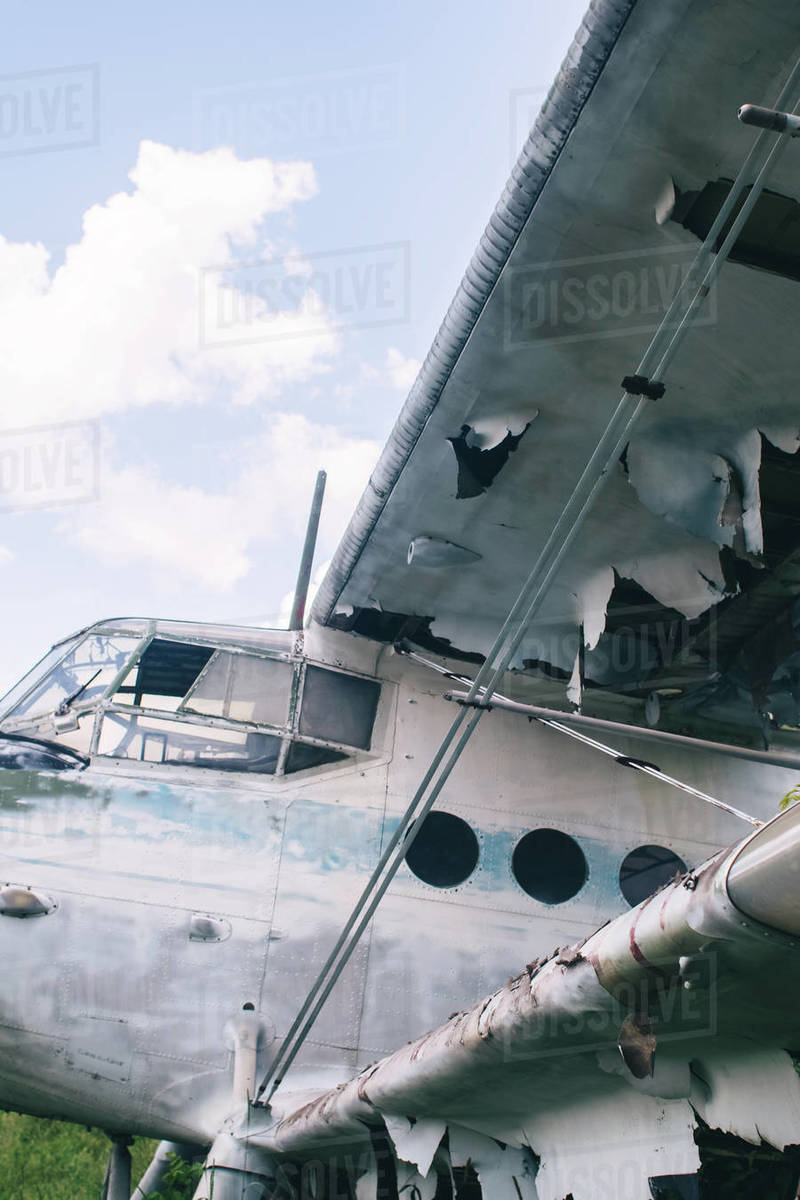 Close-up of a crashed airplane wing. The metal frame and internal parts ...