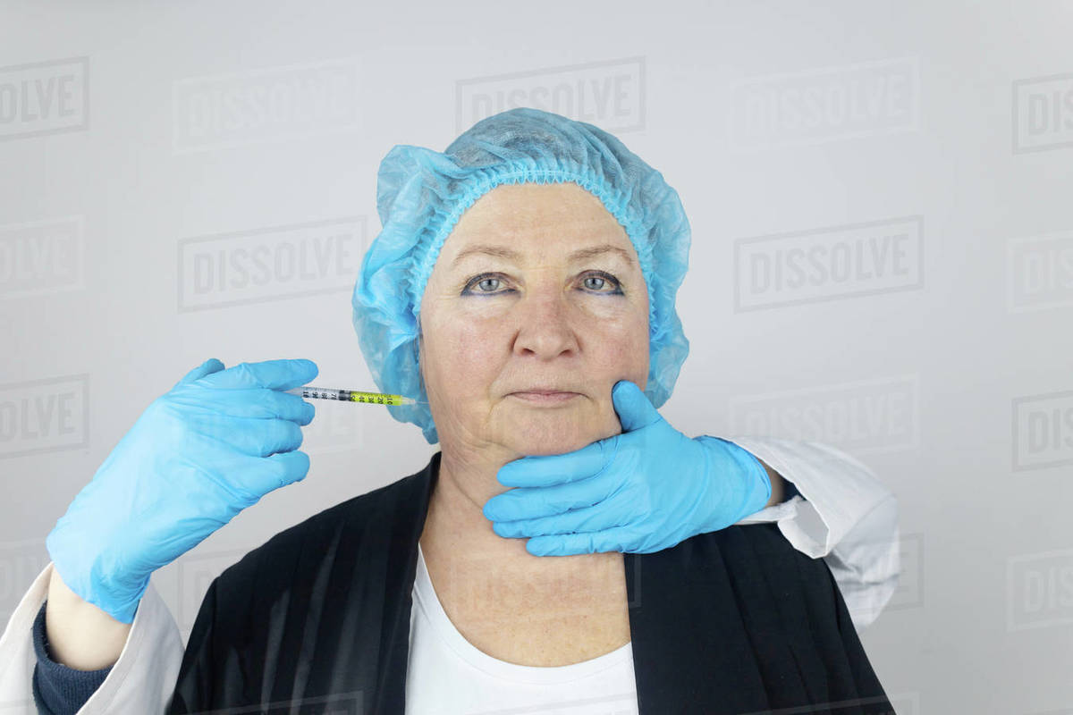 Botulinum toxin injection. Senior woman at the appointment with a ...