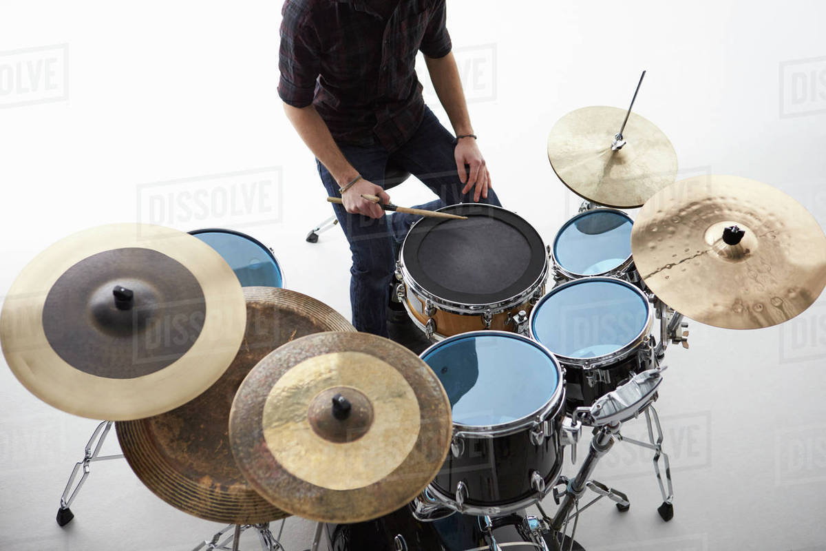 Overhead shot of drummer playing drum kit in studio - Royalty-free ...