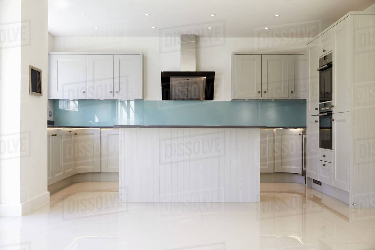 Empty kitchen in modern house - Stock Photo - Dissolve