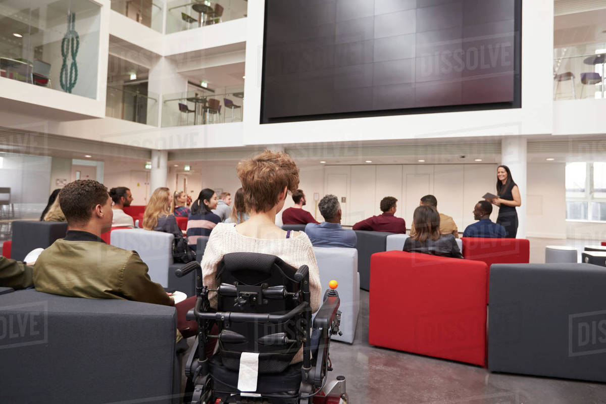 Back view of students at a lecture in a university atrium - Royalty ...