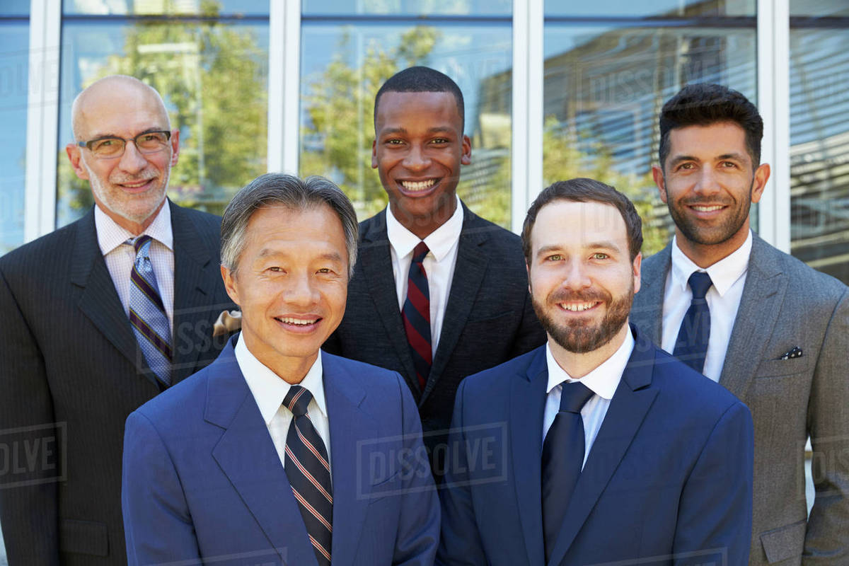 Outdoor portrait of male multi-cultural business team - Stock Photo ...
