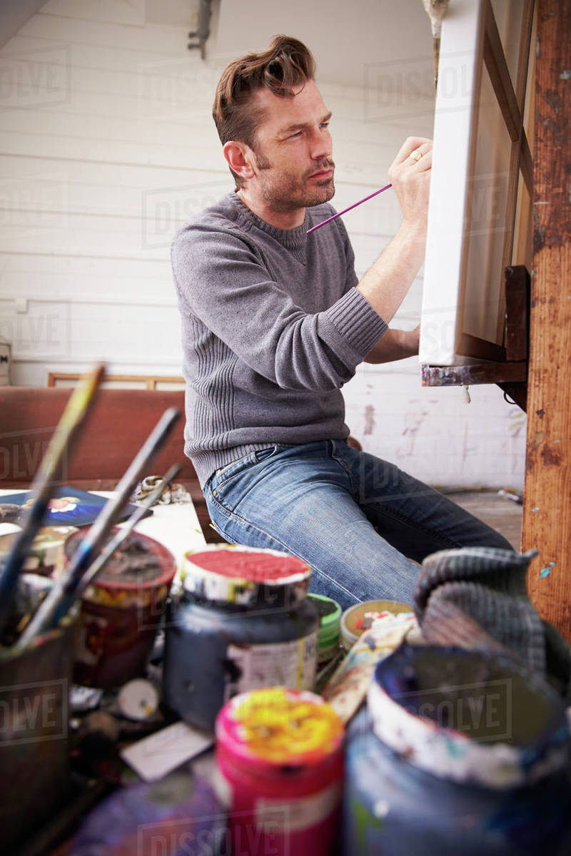 Male Artist Working On Painting In Studio - Royalty-free Stock Photo ...