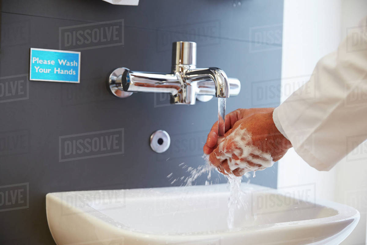Close-up of medical staff washing hands - Royalty-free Stock Photo ...