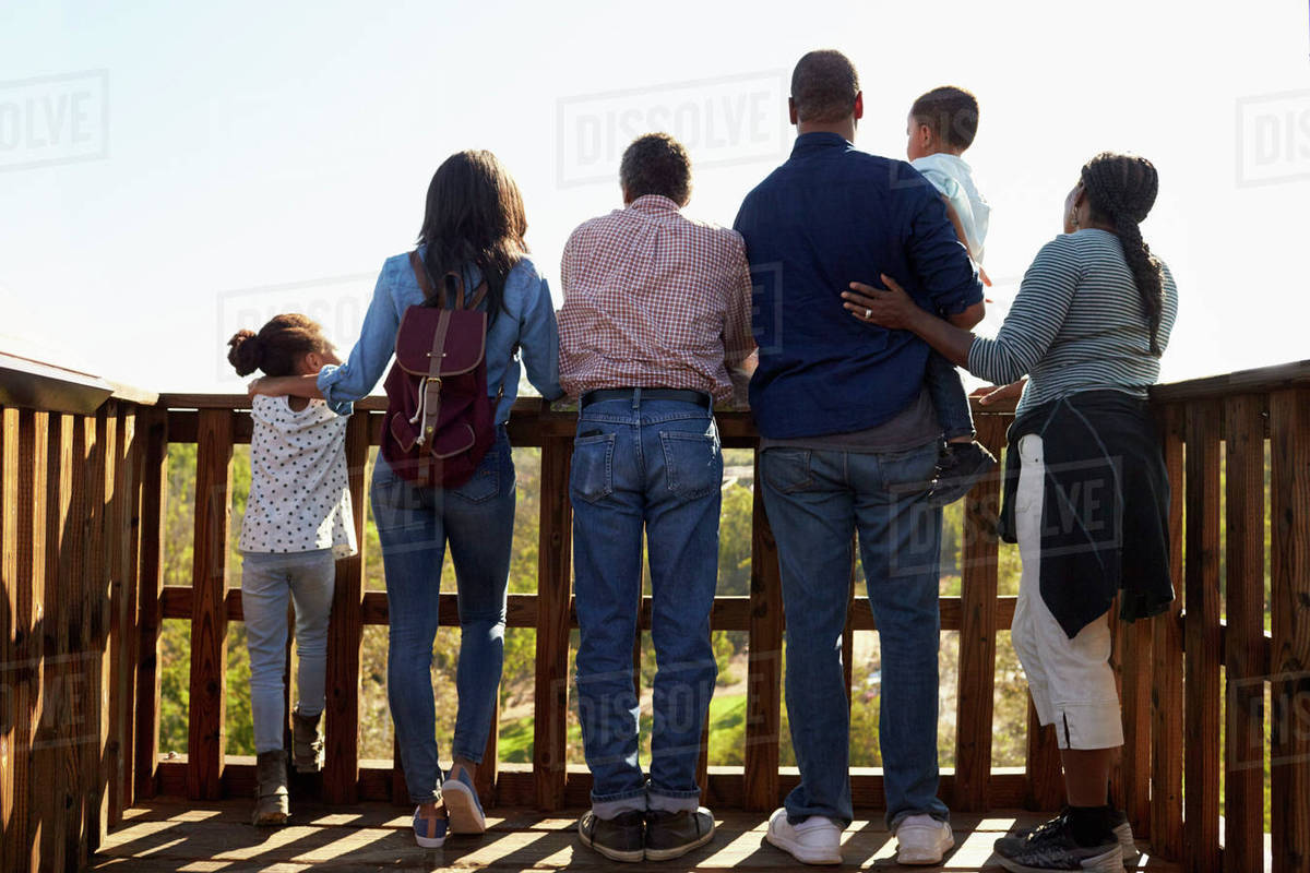 Multi generation family standing on outdoor observation deck - Royalty ...