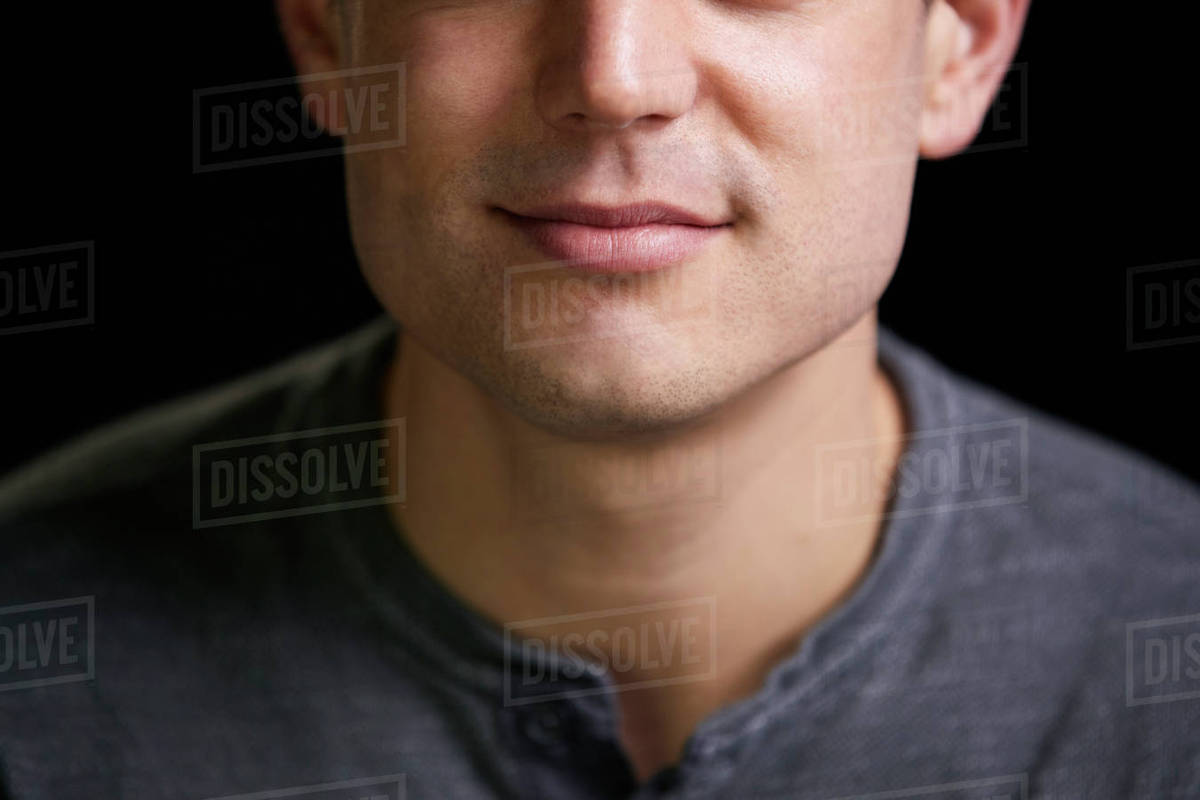 Cropped portrait of a smiling young white man - Royalty-free Stock ...