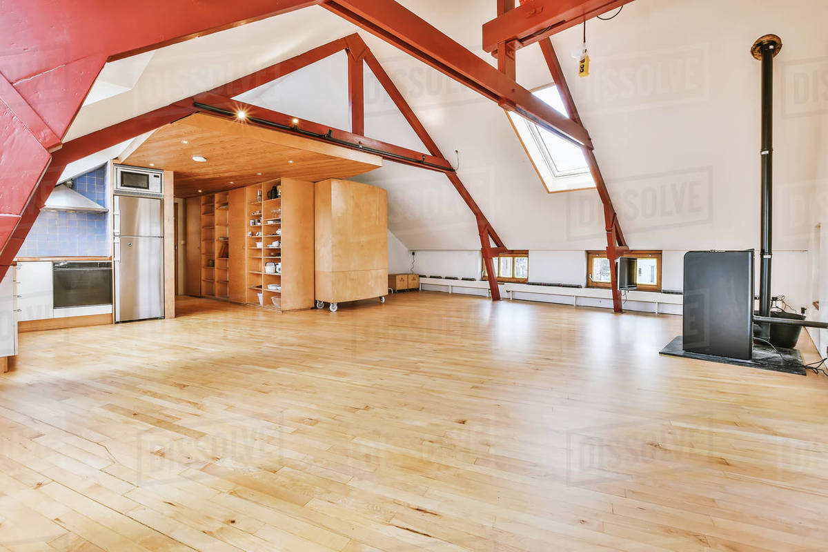 Interior of a large empty room with a triangular ceiling - Royalty-free ...