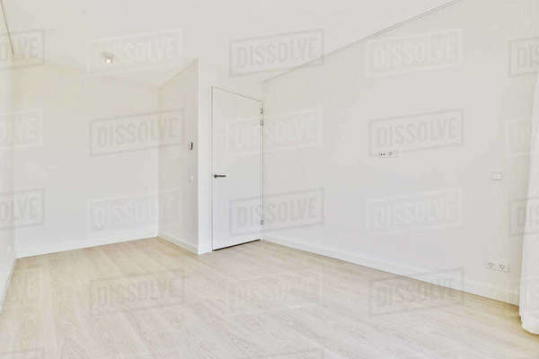 Interior of bright room with no furniture - Stock Photo - Dissolve