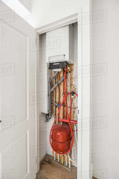 An electric dashboard with cables in a small room - Stock Photo - Dissolve