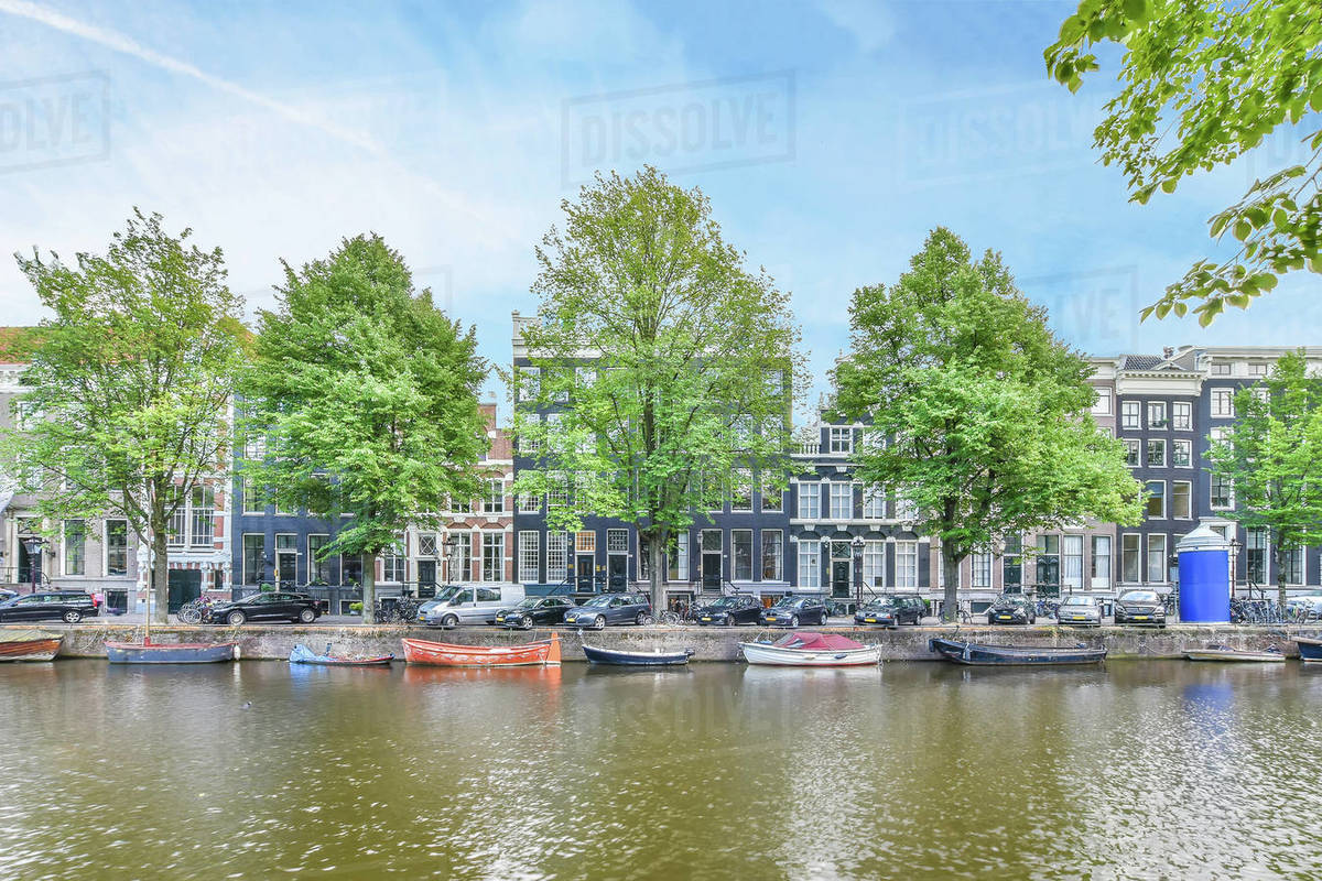 Amazing view of a residential area by the riwer - Stock Photo - Dissolve