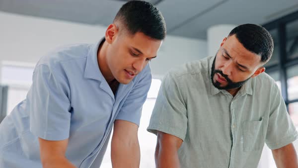 Brainstorming, teamwork and business men in office for planning ...