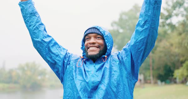 Outdoor, black man and open arms with fitness, target and winning with ...