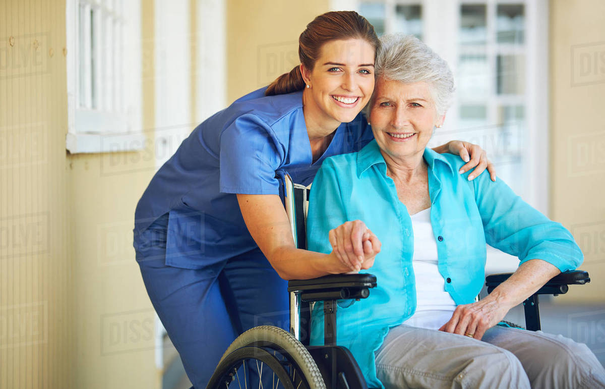 Portrait of nurse, hugging or old woman in wheelchair in hospital ...