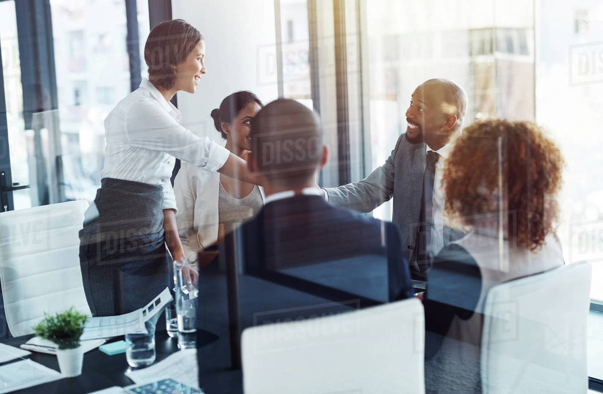 Business people, meeting and shaking hands with corporate group ...