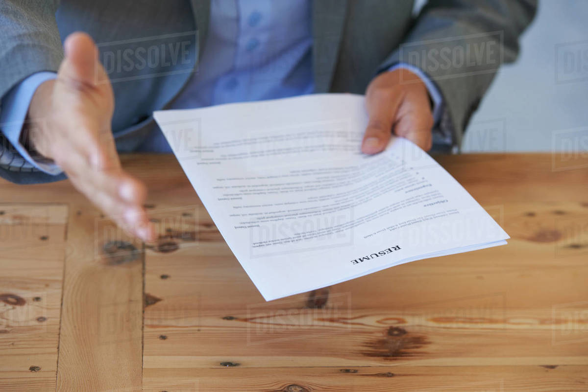 Business person, handshake offer and resume for job interview ...
