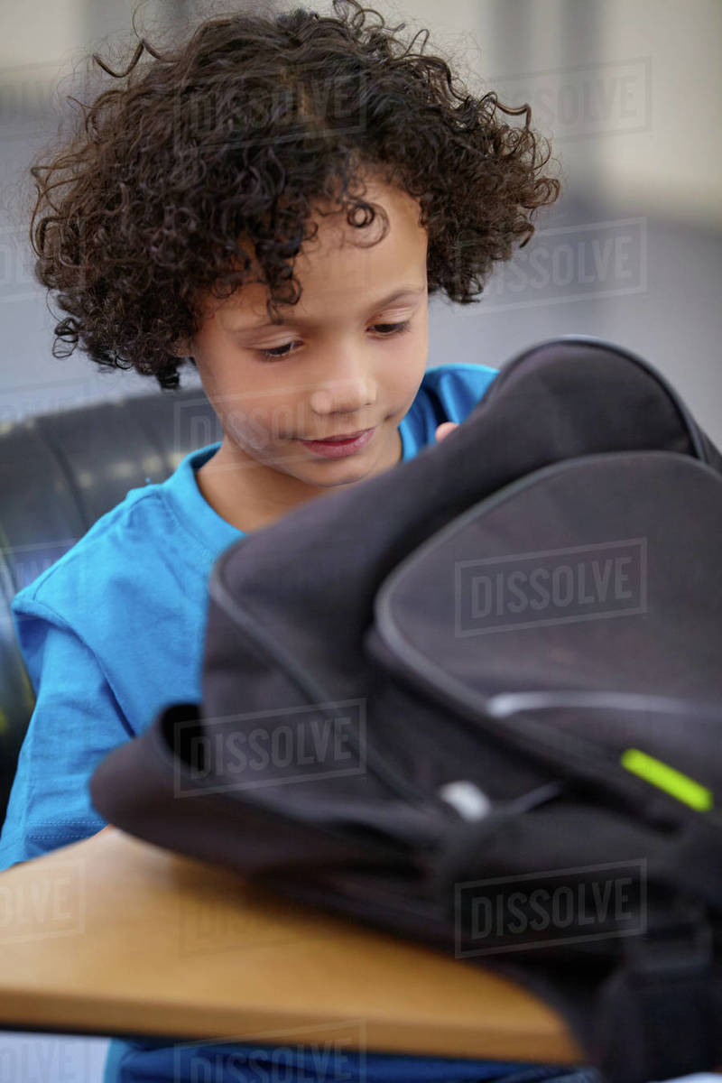 Boy, education and school bag with thinking, child development and ...