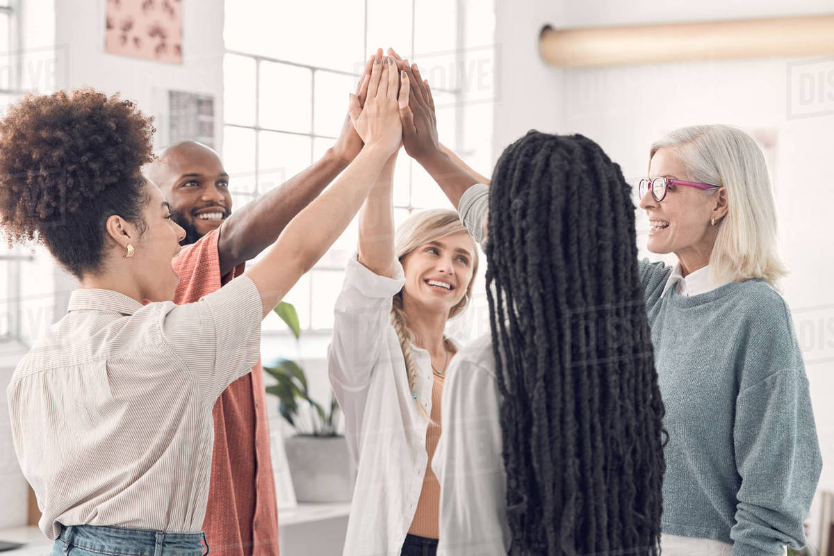 Team work, high five and group of business people with support, goals ...