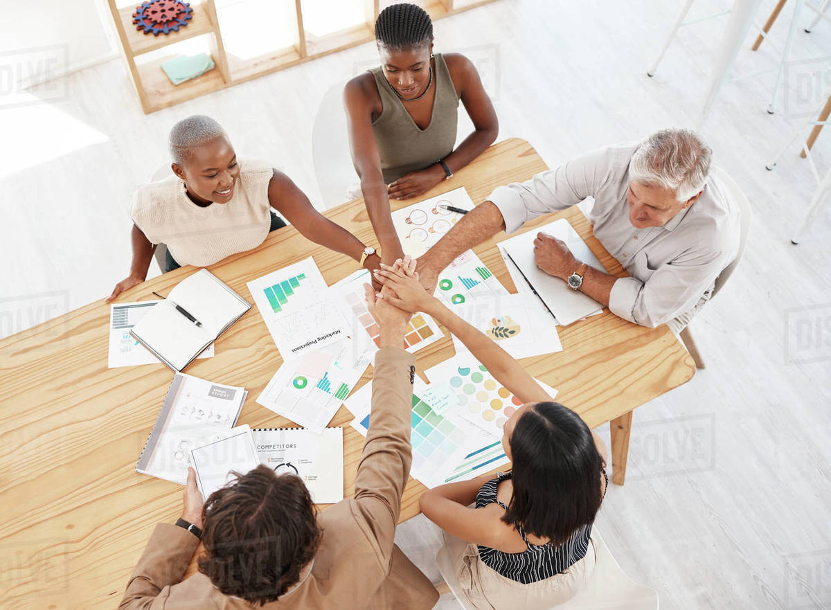 Teamwork, meeting and hands together after a branding and logo group ...