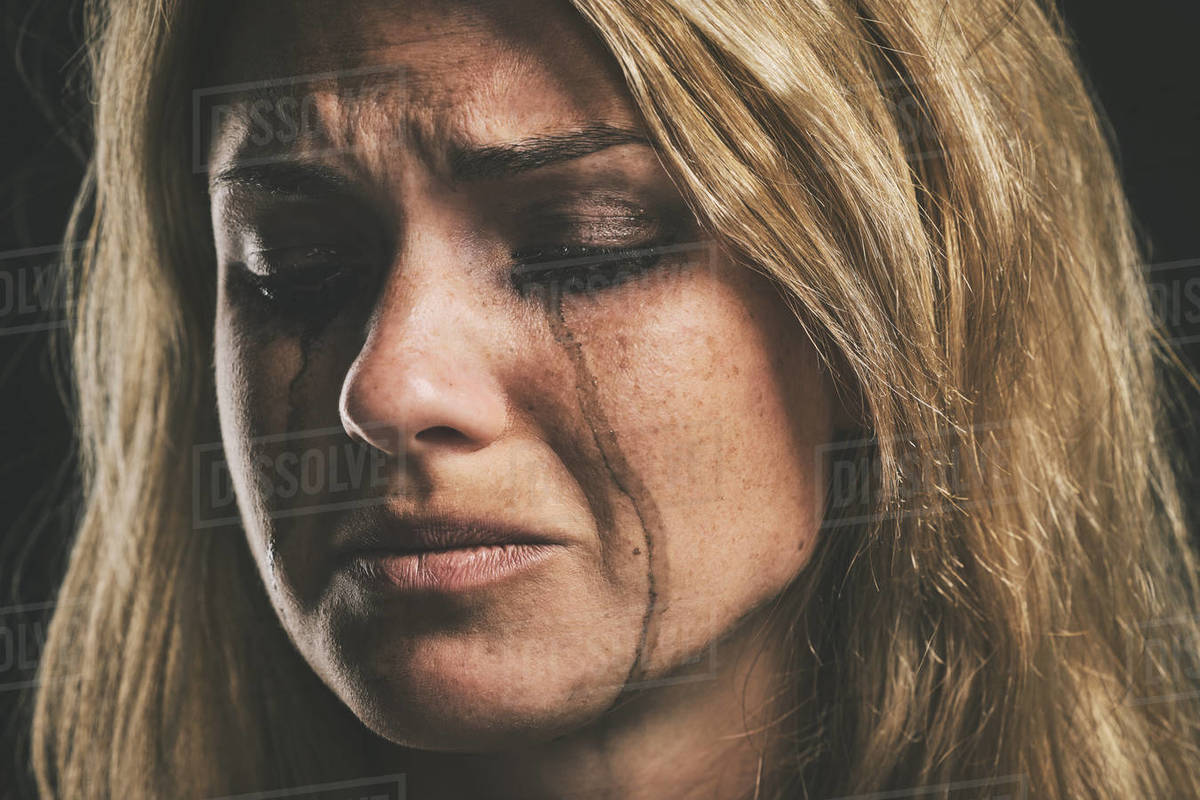 Sad, depression and woman crying on dark studio background for mental ...