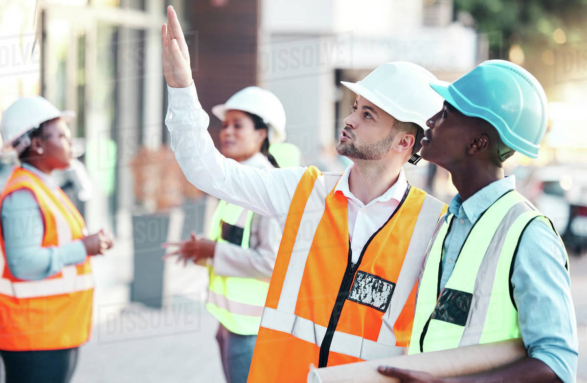 Construction worker, team and collaboration with building engineer ...