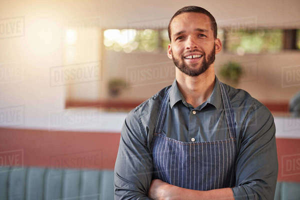 Restaurant, waiter portrait and man with arms crossed ready to take ...