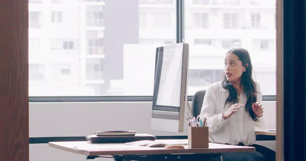 Angry businessman, hammer and broken computer monitor in office ...