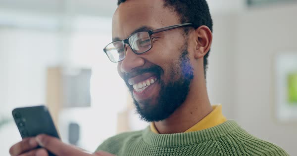 Phone, smile and social media with a black man laughing at a meme while ...
