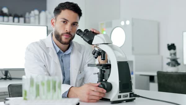 Happy, handsome and smiling scientist leading with innovation and ...