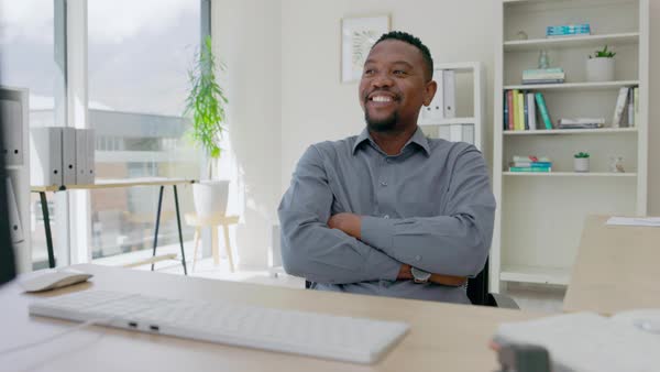 Business, happy black man and thinking at desk, office and excited ...