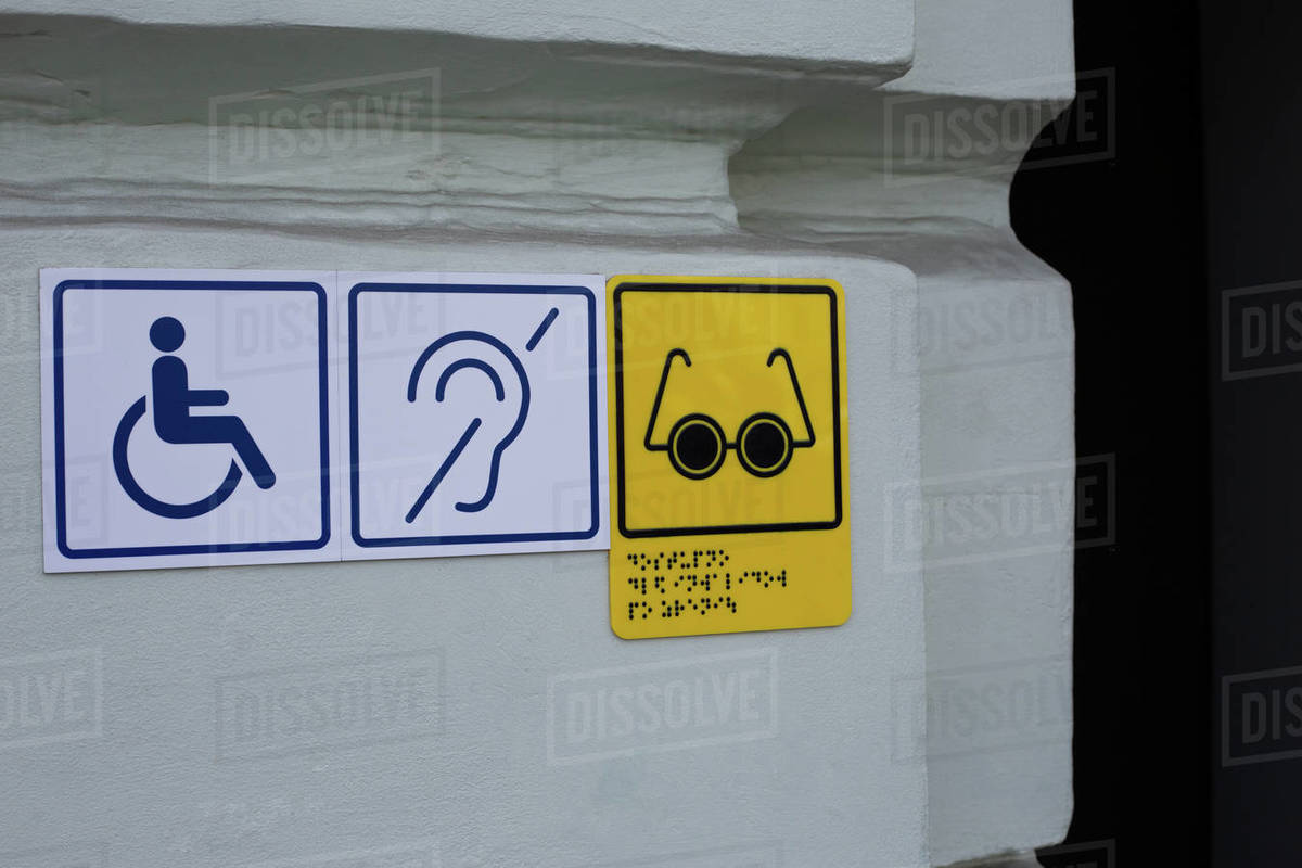 Signs indicating access for people with disabilities. Symbol of deaf ...