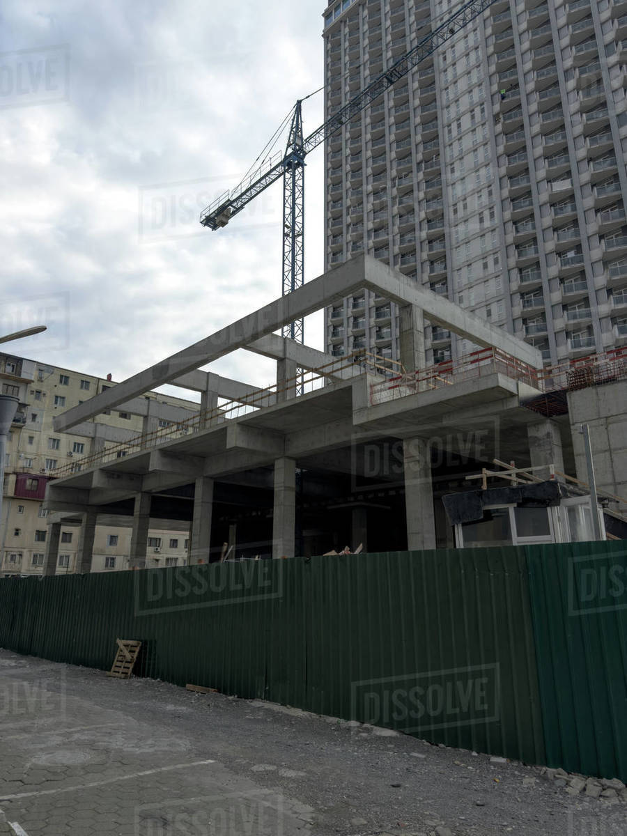 Concrete frame of residential building in first stages of construction ...