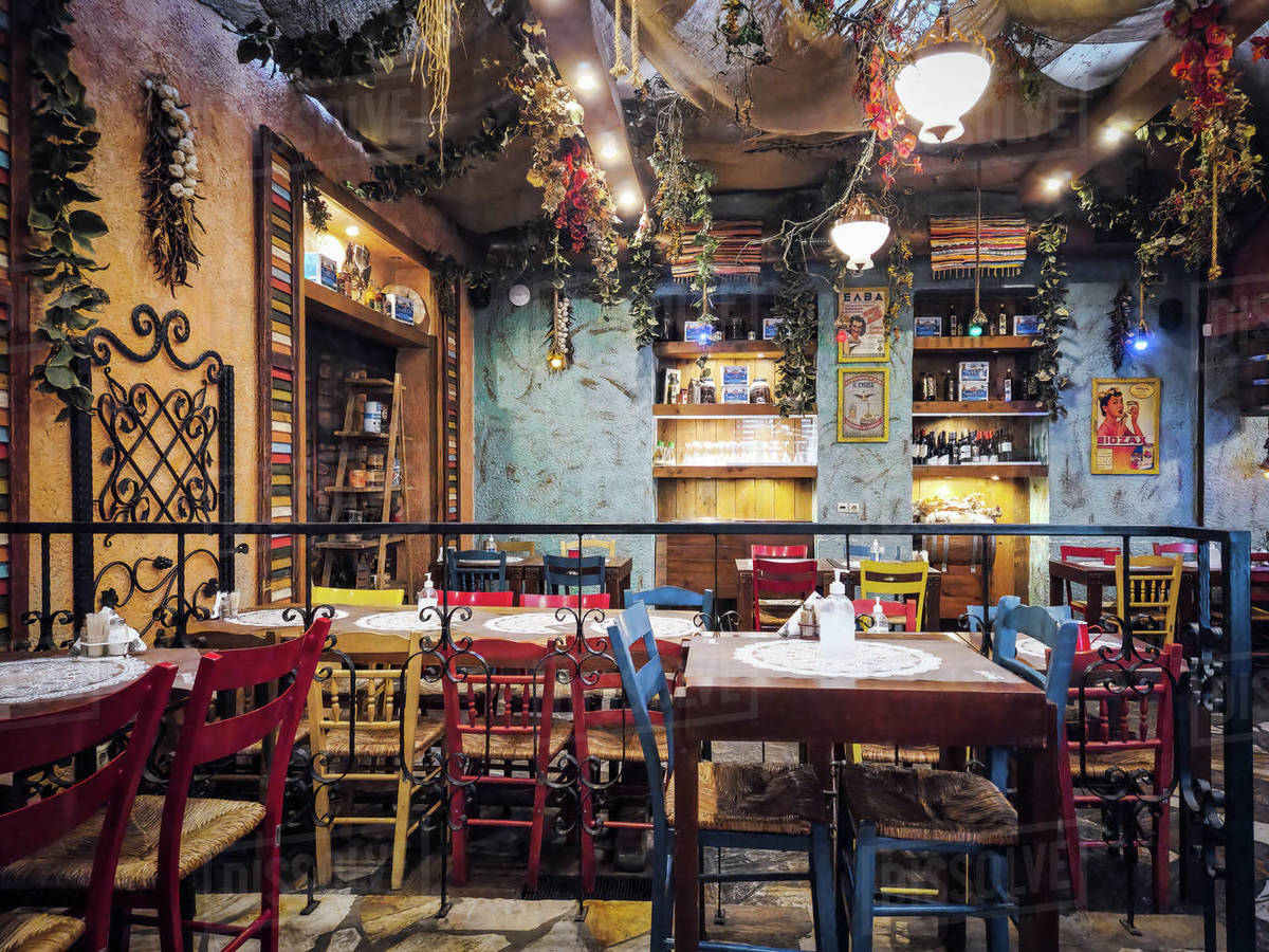Thessaloniki, Greece empty tavern indoors seating area with wooden ...
