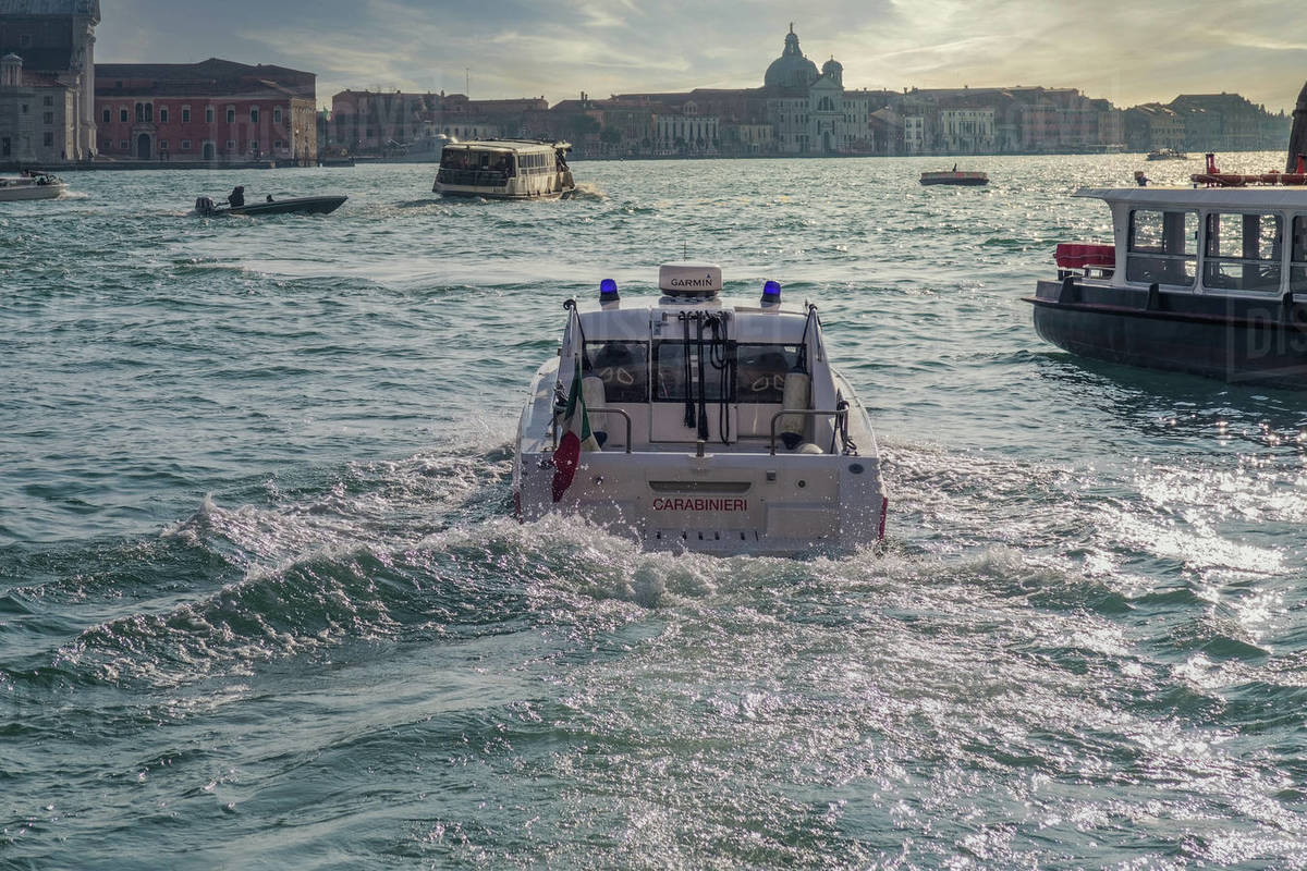 Venice, Italy Carabinieri Police Boat on the lagoon. Evening view of ...