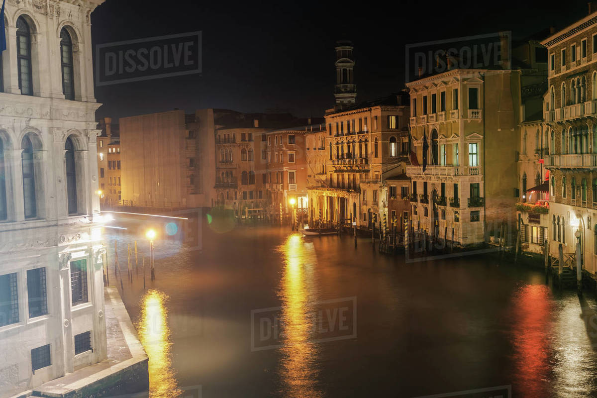 Venice, Italy Grand Canal night view of traditional low rise buildings ...