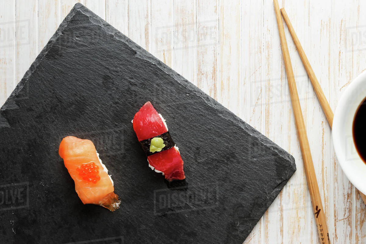 Salmon Nigiri with Salmon Roe and red tuna with wasabi paste Nigiri on ...