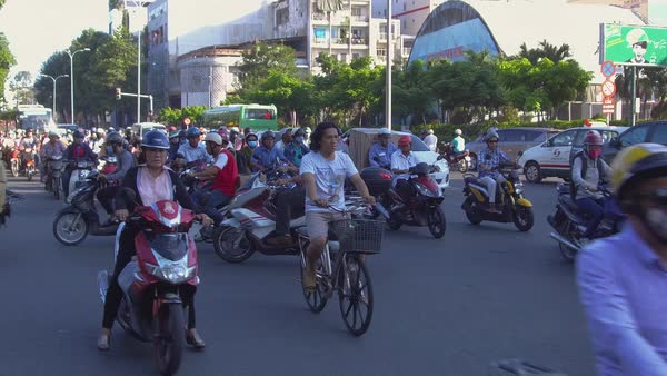 People driving vehicles on street in metropolitan city - 4K Royalty ...
