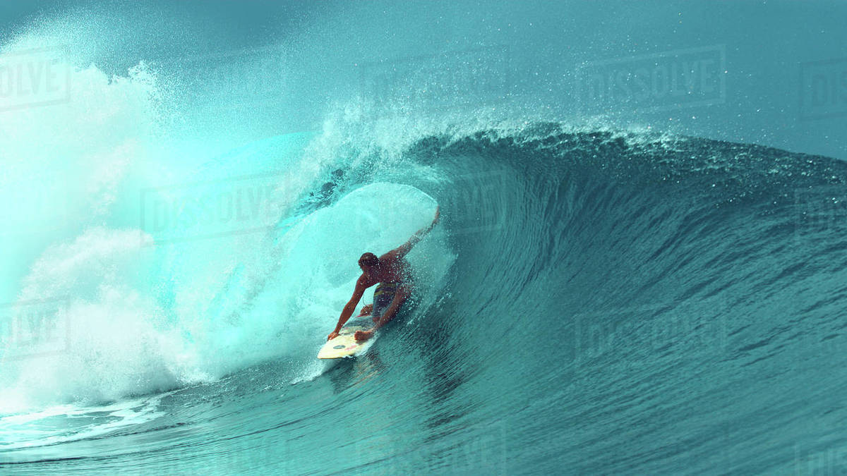 CLOSE UP: Young professional surfboarder finishes riding another epic ...