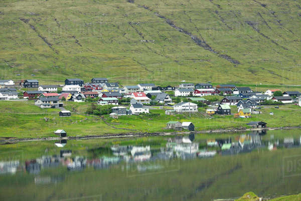 Picturesque view of riverfront houses in a small quiet village and ...