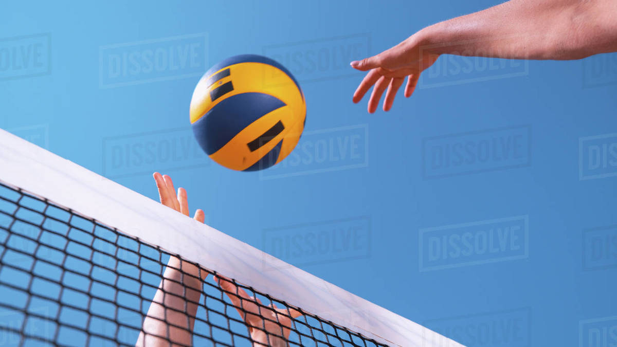 CLOSE UP, LOW ANGLE: Female volleyball player's hands score point by ...